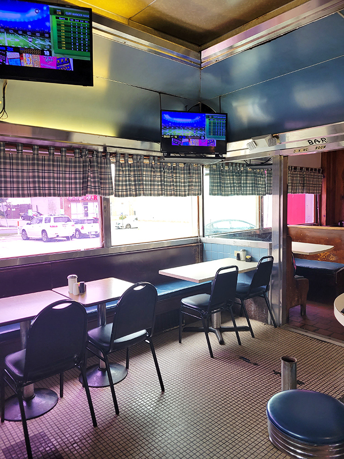 Plaid curtains, checkered floors, and TVs in the corner&mdash;this isn't retro by design, it's authentic by survival. 