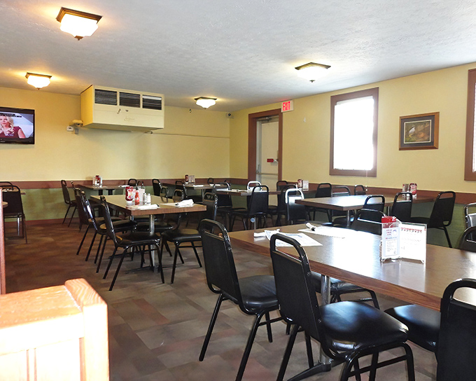 Simple tables, straightforward chairs, and zero pretension &ndash; this dining room isn't winning design awards, but that's because all artistic effort goes straight into the chicken.