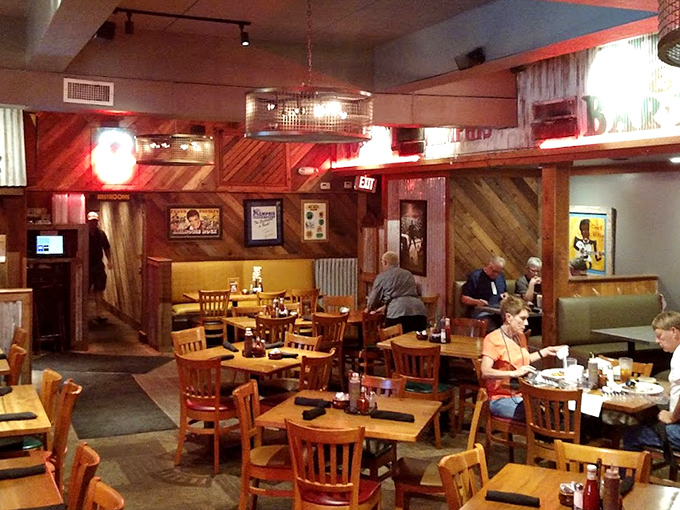 Where barbecue dreams come true: warm wood paneling, cozy booths, and the unmistakable buzz of happy diners plotting their next bite.