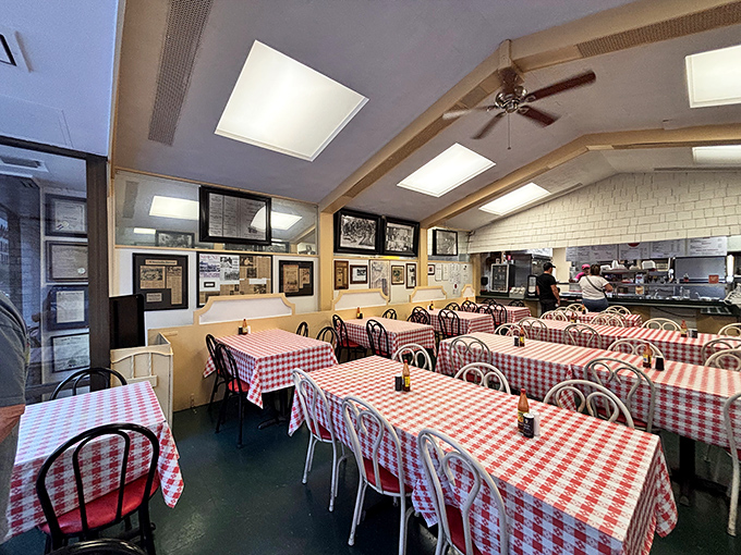 Classic red and white checkered tablecloths create a nostalgic backdrop for countless Nashville memories. This isn't trendy dining&mdash;it's timeless comfort.