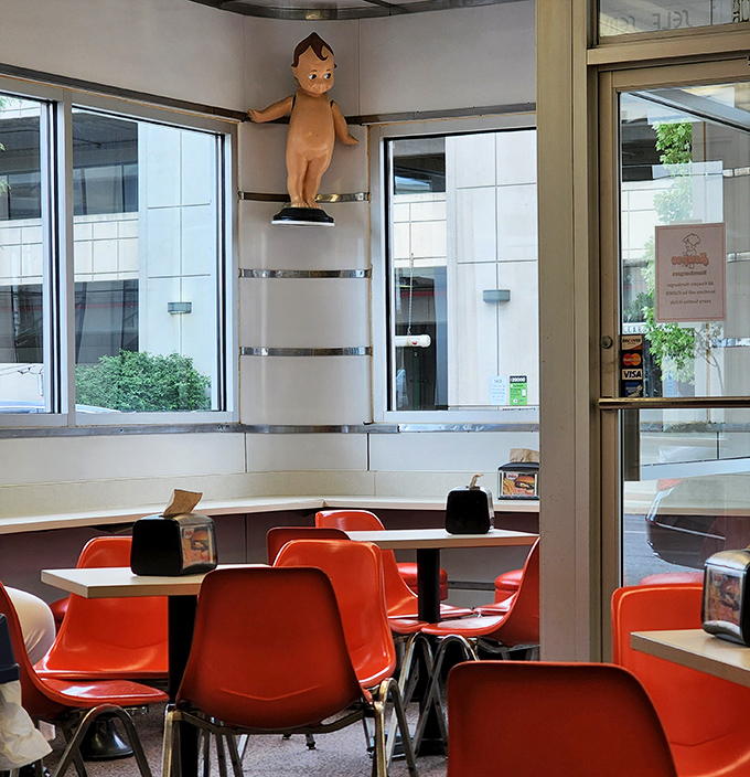 Inside, those vibrant orange chairs and vintage decor aren't trying to be retro&mdash;they're the real deal, preserved from an era when dining out was an event.