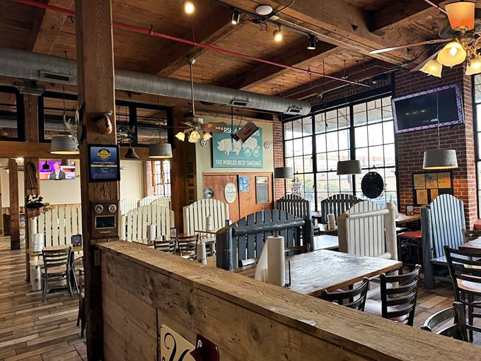 Rustic wooden beams, exposed brick, and picnic-style seating create the perfect backdrop for the serious business of barbecue appreciation.