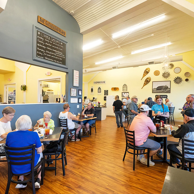 "The Gathering Place" indeed&mdash;warm wood floors and cheerful blue and yellow walls create the perfect backdrop for morning conversations.