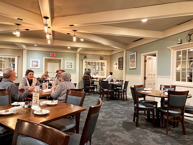 Soft blue walls and wooden beams create the perfect maritime atmosphere – like dining in a well-appointed captain's quarters without the seasickness.