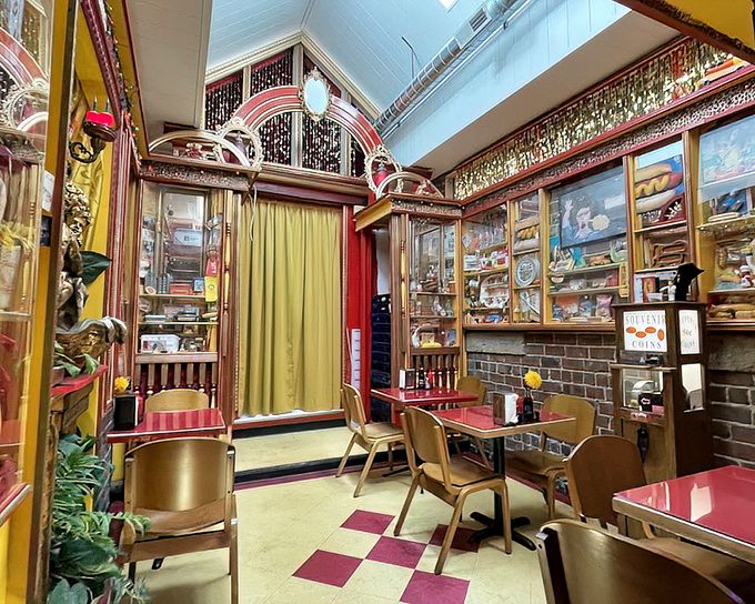Step inside and discover a whimsical wonderland that's part vintage diner, part curiosity cabinet, with display cases that could tell a thousand stories.