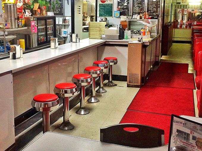 The red counter stools at K's aren't just seats &ndash; they're front-row tickets to the greatest show in Troy: breakfast and burgers made the old-school way.