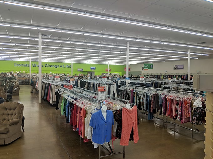 Rows upon rows of color-coded clothing stretch toward infinity, a textile rainbow promising fashion finds at fraction-of-retail prices.