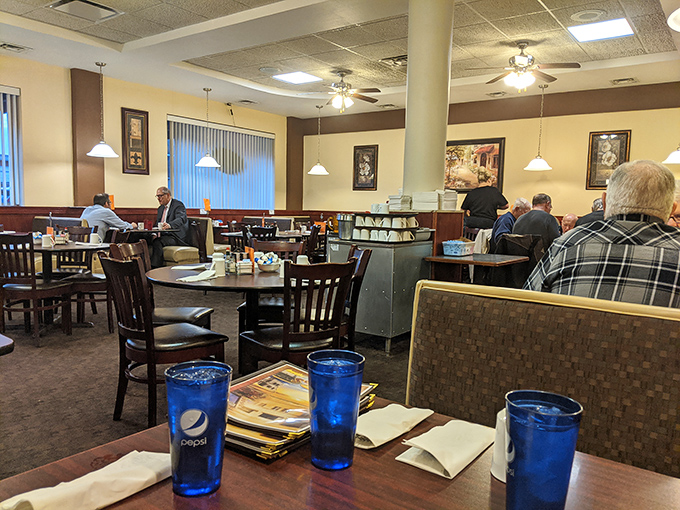 Step inside to a world where yellow walls, wooden tables, and the gentle hum of conversation create that perfect diner atmosphere you've been craving all along.