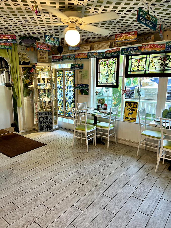 Wisdom rains from above as hundreds of colorful signs transform breakfast into a philosophy lesson with a side of stained glass beauty.