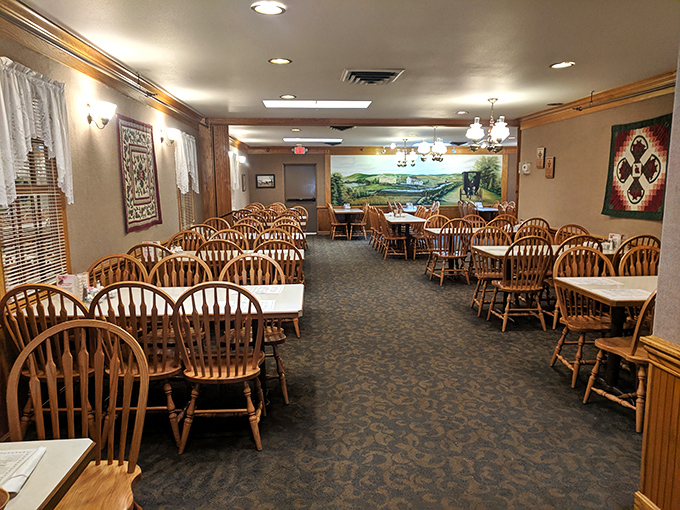 Windsor-back chairs and warm wood tones create a dining room that whispers "slow down and stay awhile"&mdash;the antithesis of our frantic, phone-scrolling world.