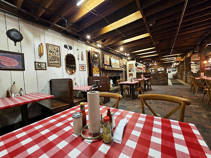 Red and white checkered tablecloths set the stage for Southern feasting, while walls adorned with vintage memorabilia tell stories of simpler times.