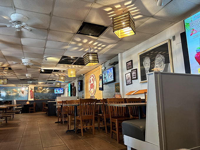 Inside Crabby Bill's, nautical nostalgia meets dining comfort. The walls tell stories of epic catches while ceiling fans keep the conversation flowing.