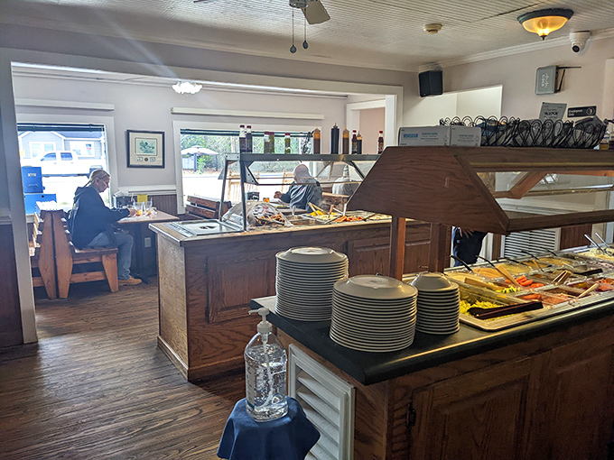 Inside, the buffet awaits like a Southern food museum where every exhibit is edible. The wooden interior adds warmth that no designer could replicate.