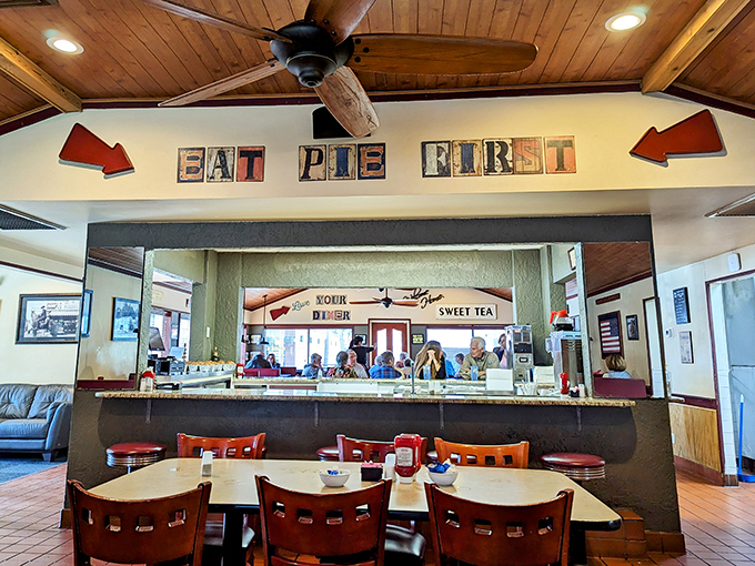 "EAT PIE FIRST" isn't just decoration, it's sound life advice from a kitchen that understands priorities. The wooden ceiling beams add rustic charm to this beloved Lakeland institution.