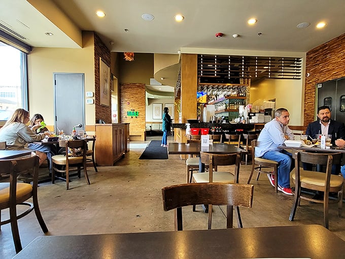 Clean lines and warm woods create a dining room where the focus stays exactly where it belongs: your plate.