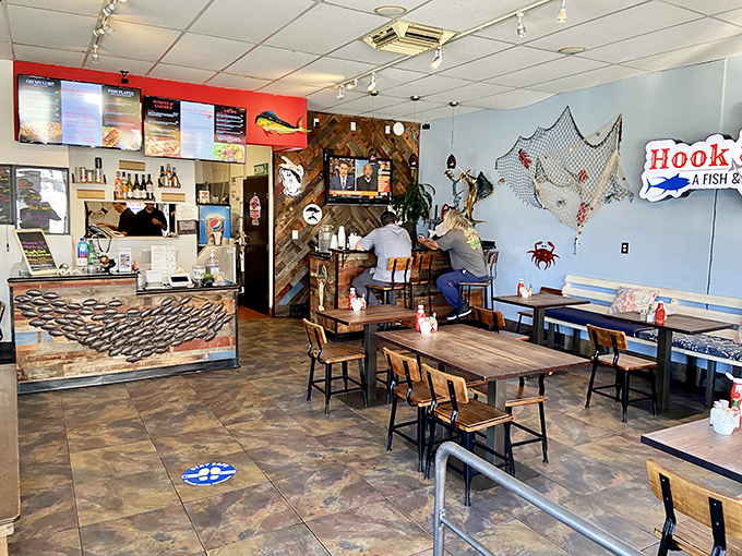 Nautical charm meets no-nonsense dining inside Hook & Anchor, where fishing nets and wooden accents create the perfect backdrop for seafood revelations.