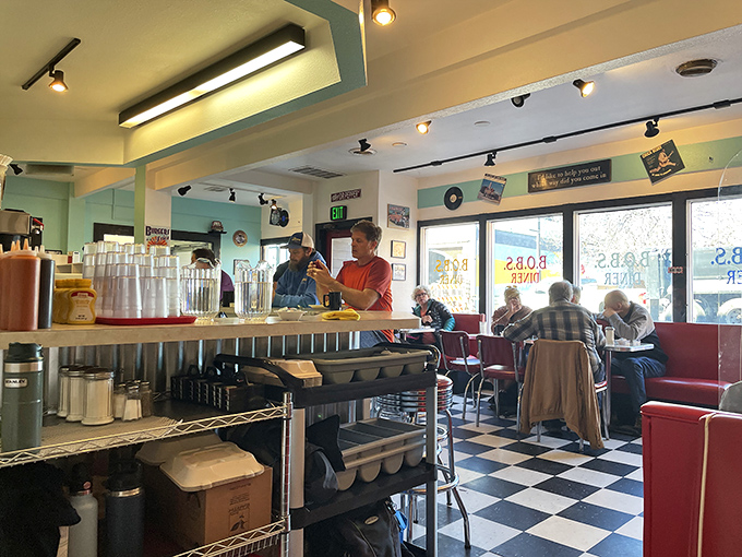 Inside, the classic checkerboard floor and mint green walls create the backdrop for countless Louisville mornings and the breakfast dreams they inspire.