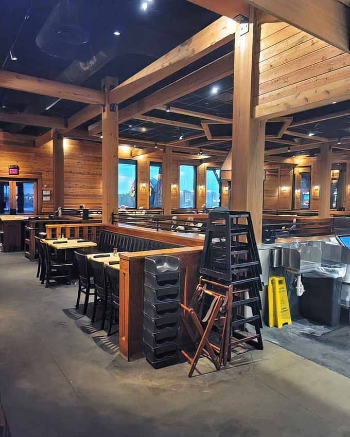 Exposed wooden beams and cozy booth seating create that perfect "welcome home" feeling&mdash;if your home happened to be a luxurious Alaskan fishing lodge.