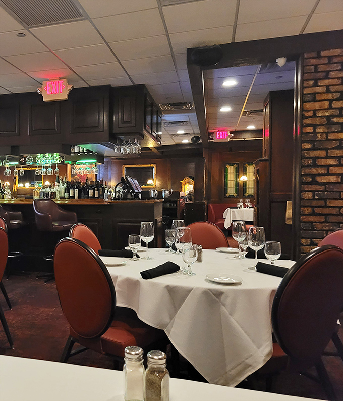 Step inside and leave Mickey Mouse behind. This dimly lit sanctuary of brick, wood, and white tablecloths whispers "serious food happens here" without saying a word.