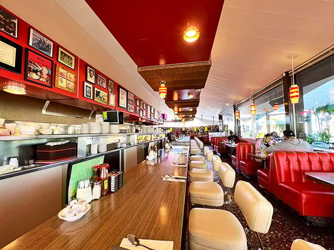 The counter seats are front-row tickets to culinary theater, where red vinyl booths and cream swivel chairs have witnessed decades of breakfast epiphanies.