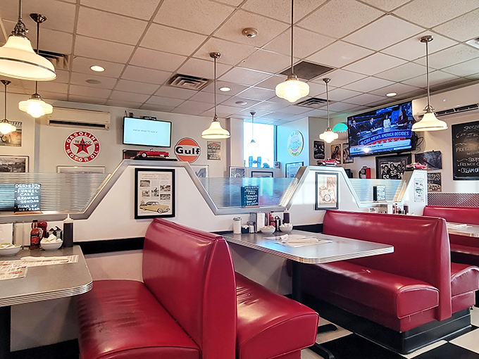 Classic Americana comes alive in these gleaming red vinyl booths. The vintage Gulf and Texaco signs aren't just decoration&mdash;they're time machines.