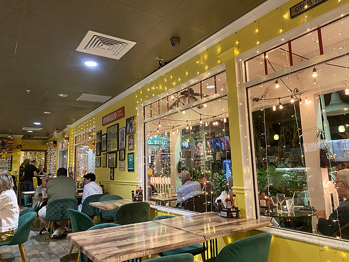 Cheerful yellow walls adorned with maritime memorabilia and twinkling string lights create that "I've just discovered something special" atmosphere inside.