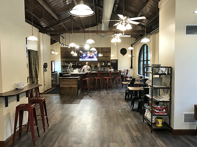 High ceilings, exposed beams, and natural light create the perfect backdrop for the pizza magic that happens daily.