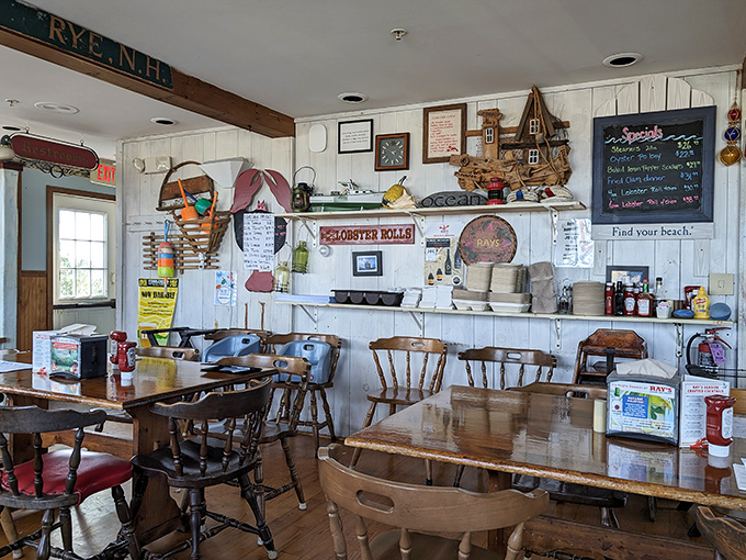Inside, whitewashed walls adorned with nautical treasures create the perfect backdrop for seafood feasts. That "Lobster Rolls" sign isn't just decoration&mdash;it's a promise.