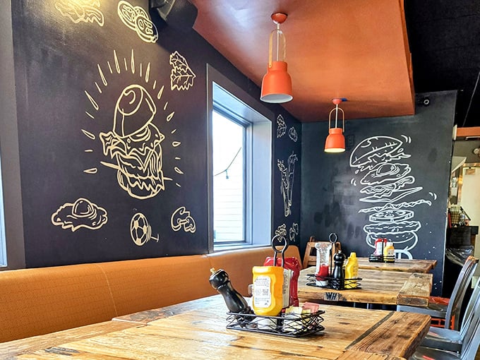 Chalkboard burger art that belongs in a museum. If Picasso had been obsessed with perfect patty-to-bun ratios, this would be his masterpiece.