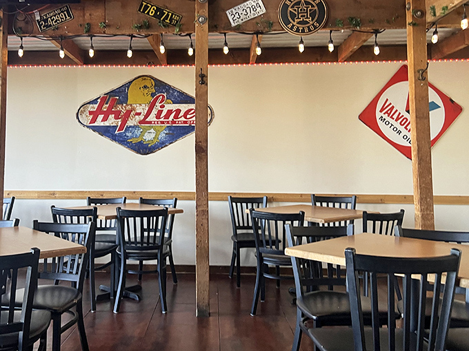 Vintage signs and simple furnishings create that perfect "third place" atmosphere&mdash;somewhere between home and work where everybody feels welcome.