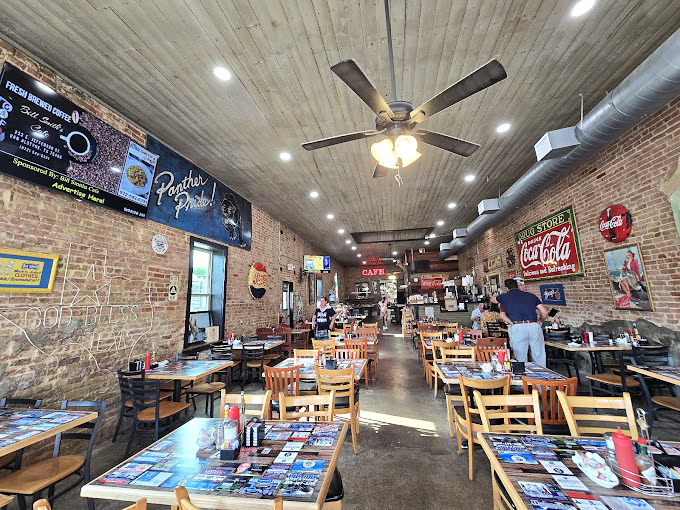 Exposed brick, Coca-Cola nostalgia, and ceiling fans&mdash;this isn't a museum, it's where great food meets authentic small-town charm.