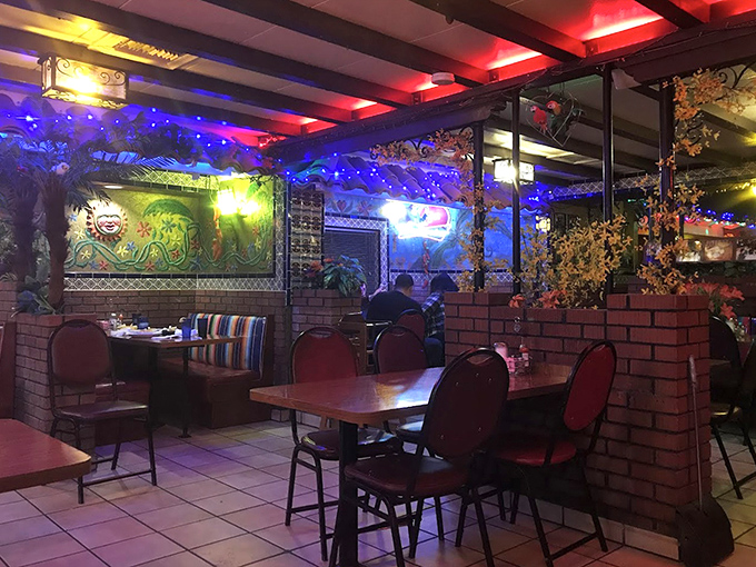 Step inside and the fiesta begins before the first bite. Colorful lights, vibrant murals, and cozy brick dividers create dining nooks that feel like Mexico's warmest hug.