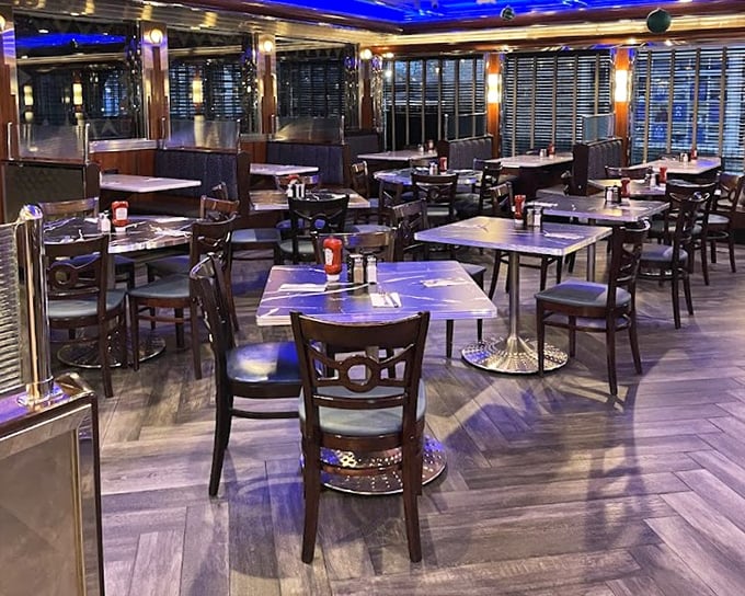 Inside, the herringbone floors and circular-backed chairs create an atmosphere that says, "Stay awhile, your diet can wait until tomorrow."