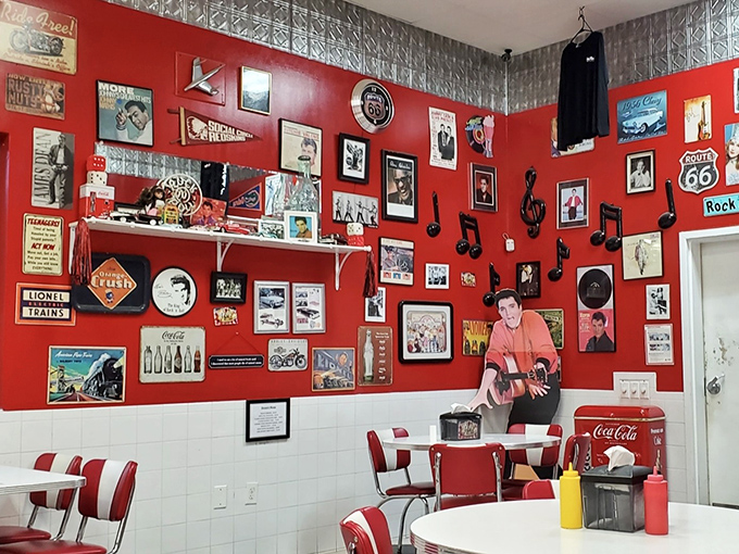 The walls tell stories the menu can't, with every inch of red covered in memories, music, and mid-century magic.