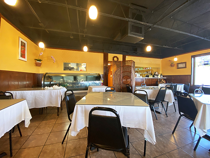 Simple yellow walls and white tablecloths prove you don't need velvet ropes to create something genuinely special and inviting.