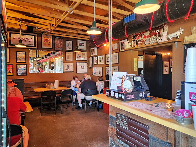 Inside this barbecue sanctuary, walls adorned with accolades tell stories of smoked meat pilgrimages while diners commune in reverent appreciation.