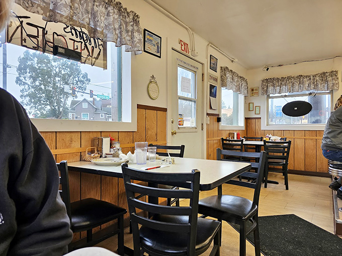 Inside, wood paneling and patterned curtains transport you to a simpler time when conversations happened face-to-face and phones were just for calling.