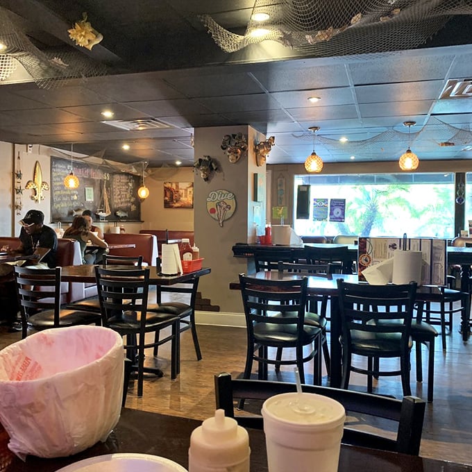 Fishing nets and New Orleans flair transform this casual dining room into a little slice of the bayou. No white tablecloths needed when the food does the talking.