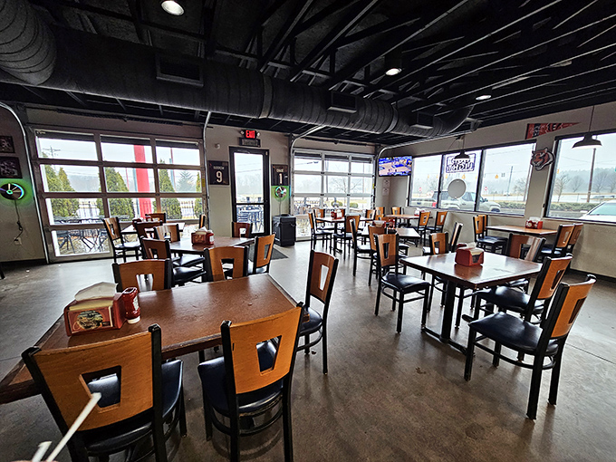 Industrial-chic meets comfort in this bright, airy dining room where wooden tables await the parade of smoky treasures about to grace your plate.