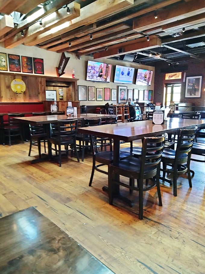 Exposed wooden beams and warm lighting create that rare atmosphere where both first dates and fantasy football drafts can thrive equally well.