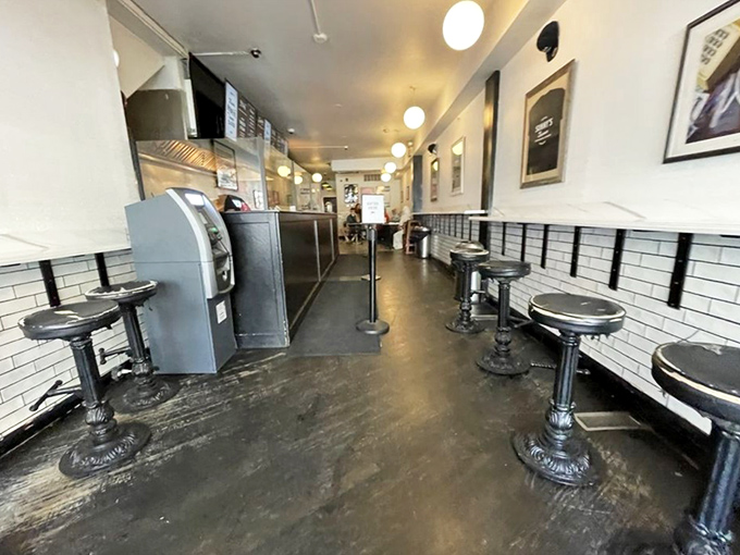 Minimalist perfection&mdash;subway tiles and metal stools announce that here, it's all about the food, not the frills.