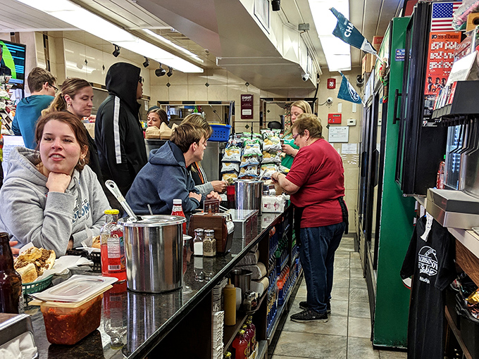 Organized chaos at its most delicious. The counter at Dalessandro's is where sandwich dreams materialize before your very eyes.