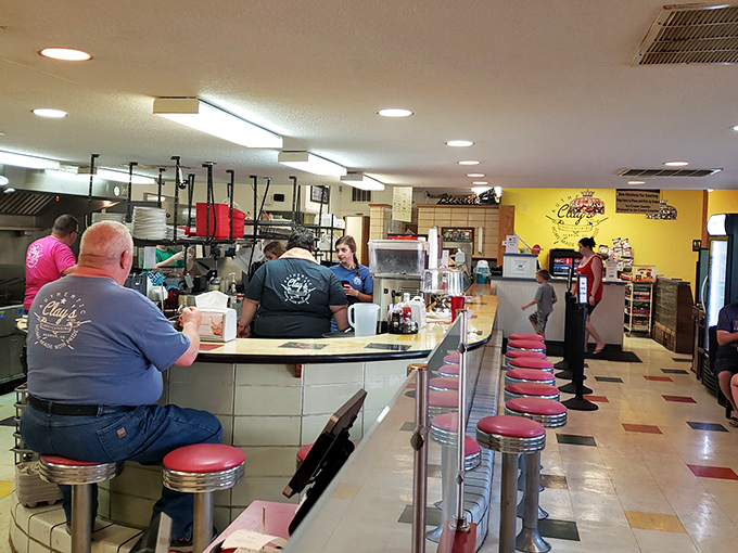 Classic diner vibes with those red vinyl stools where locals perch like birds on a wire, sharing town gossip.