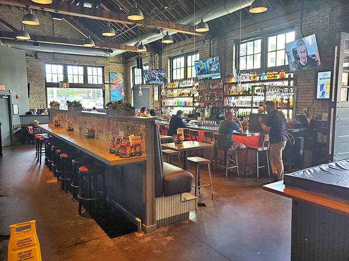 Industrial-chic meets maritime charm in this airy bar area, where exposed brick and wooden beams create the perfect backdrop for seafood storytelling.