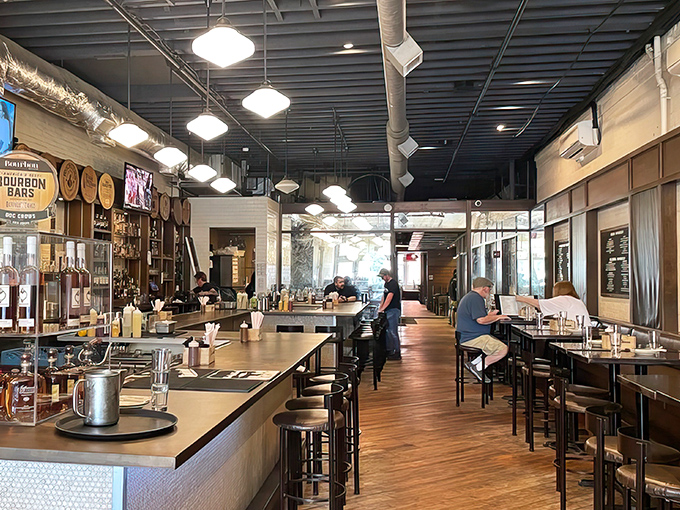 Bourbon barrels line the walls while warm wood tones invite you to pull up a stool. This isn't just a bar&mdash;it's Kentucky's liquid history museum.