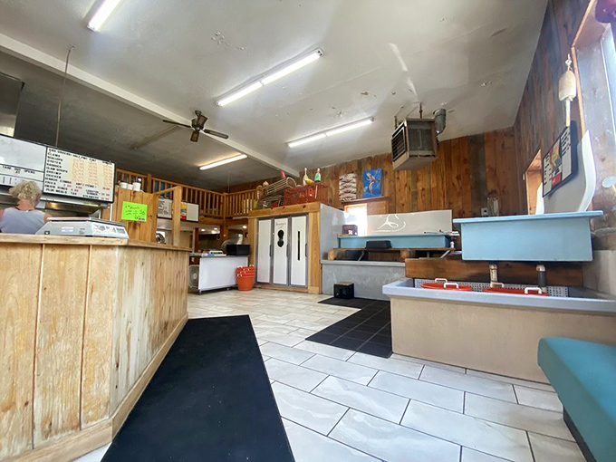 Endless aisles stretch toward the horizon under the "Furniture Gallery" sign, promising treasures at every turn.