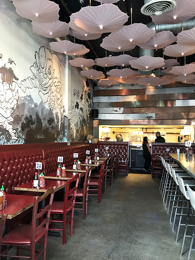 Step inside to a world where parasol-like fixtures float overhead, creating an atmosphere that's equal parts modern Portland and timeless Hanoi.