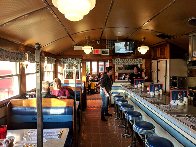 Vintage Americana adorns the walls &ndash; Pepsi caps, Coca-Cola signs, and highway markers create a museum-like quality that'll transport you to simpler times.