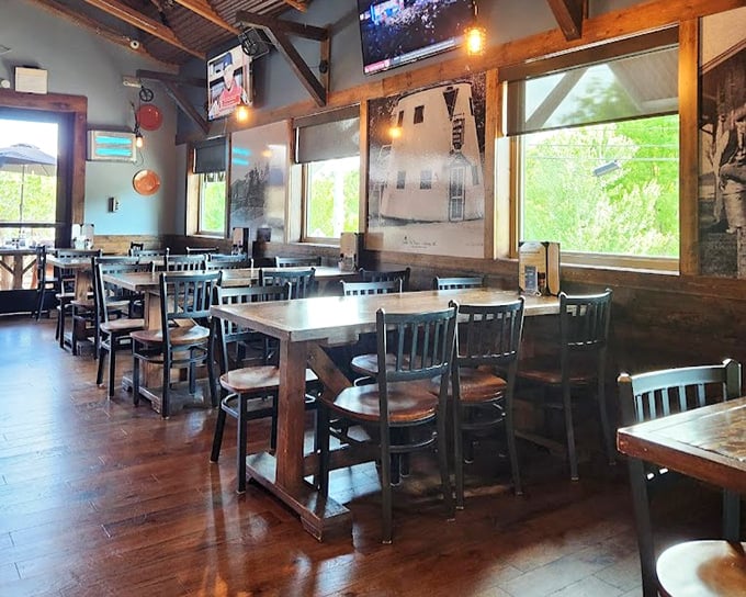 Wooden beams, natural light, and comfortable seating create the perfect backdrop for memorable meals. It's like dining in a stylish friend's cabin.