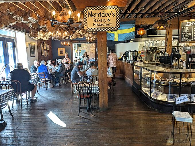 Where rustic charm meets culinary comfort. The exposed beams, hanging baskets, and checkered tablecloths create the perfect backdrop for carb-induced happiness.